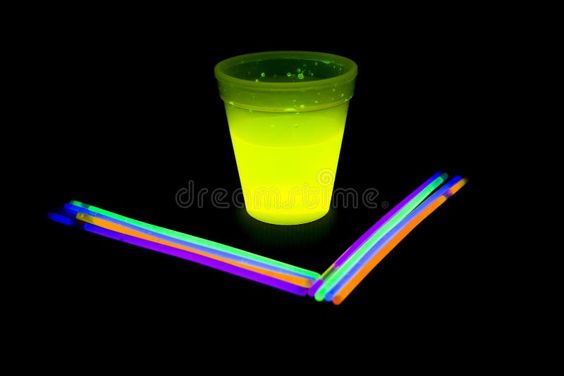 Yellow Colored Fluorescent Glass with Glow Sticks Lights Stock Photo ...