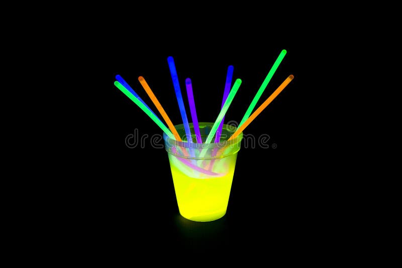 Yellow Colored Fluorescent Glass with Glow Sticks Lights Stock Image ...