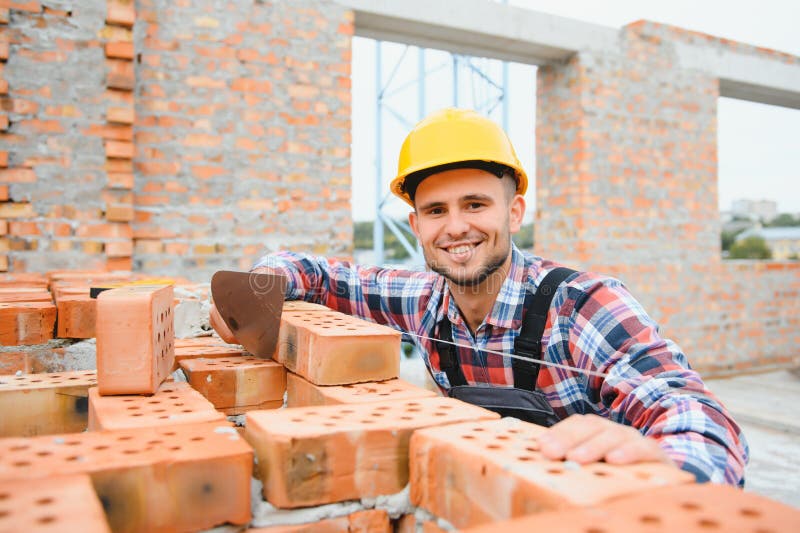 Yellow Colored Hard Hat. Young Man Working in Uniform at Construction ...