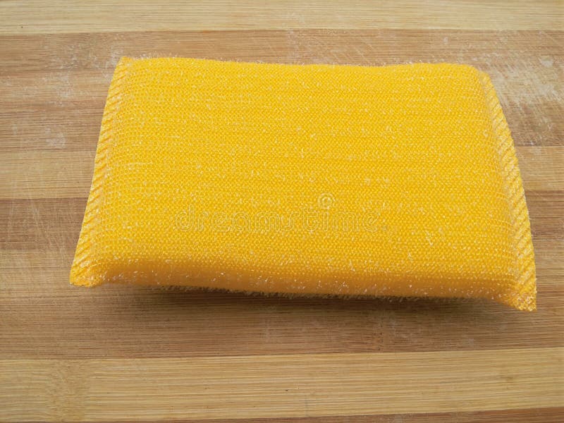 Yellow colored scrub pad stock photo. Image of colored - 64724794
