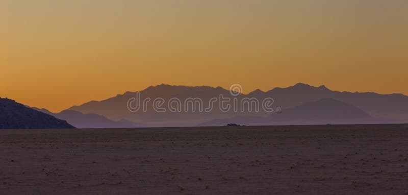 Yellow Sunset and Clouds at the Dune in Namib Desert Stock Photo ...