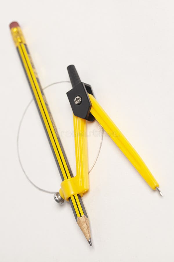 Yellow Compass with Pencil Isolated on White Background Stock Image ...