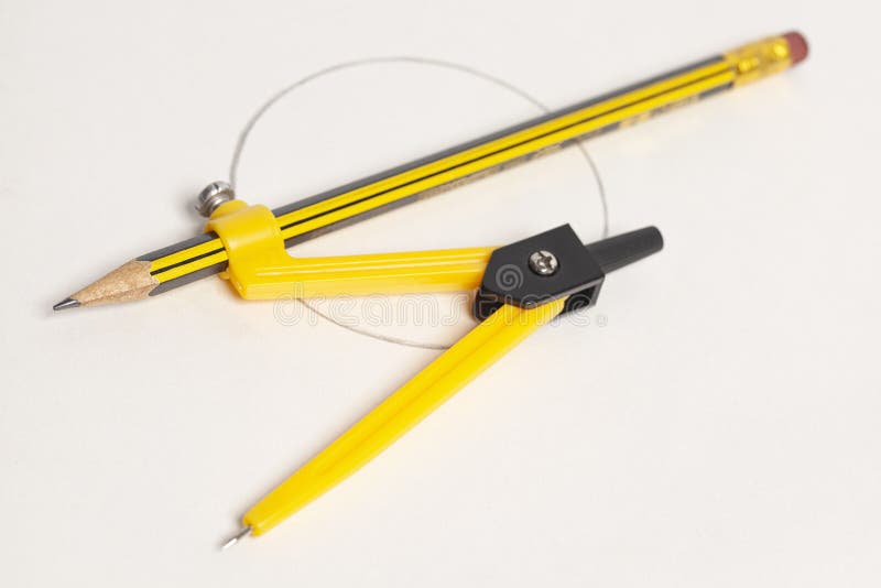 Yellow Compass with Pencil Isolated on White Background Stock Photo ...