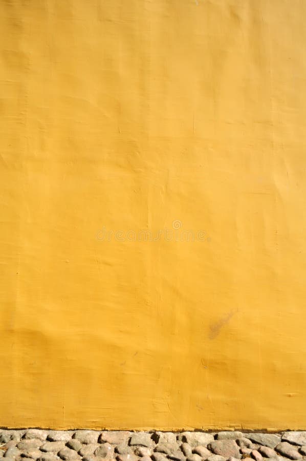 Yellow Concrete Wall stock image. Image of detail, textured - 19559261