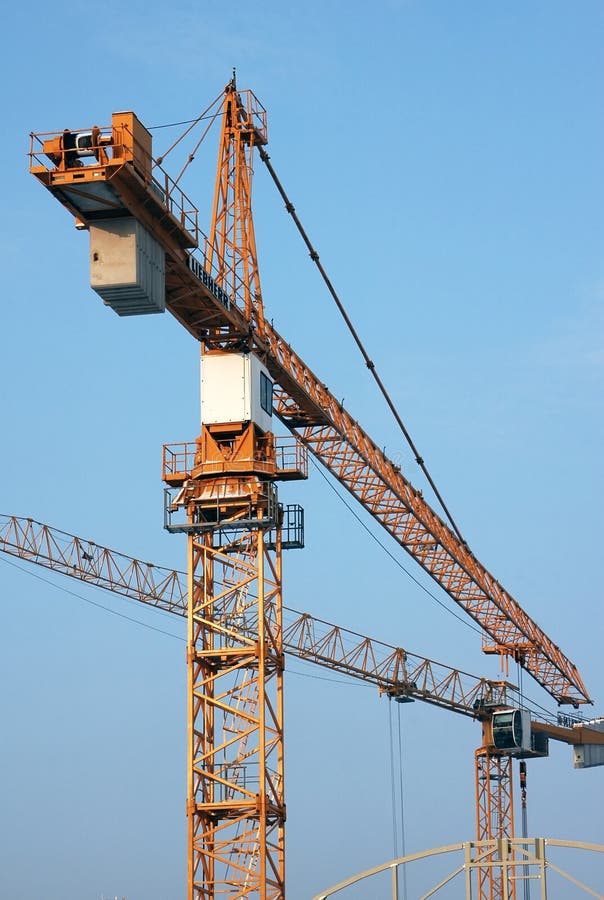 Yellow construction crane stock photo. Image of house - 12281110