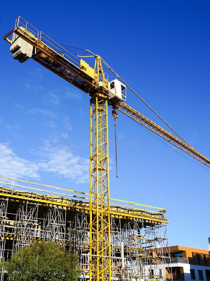 Yellow Construction Crane and Concrete Formworks Structure in New ...
