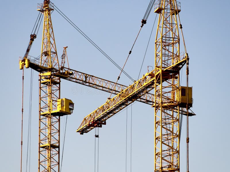 Yellow Construction Cranes stock photo. Image of development - 88990170