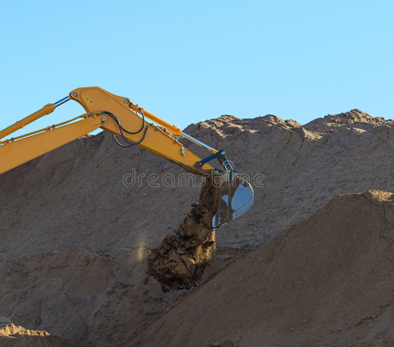 Yellow Construction Excavator at Work Stock Photo - Image of ...