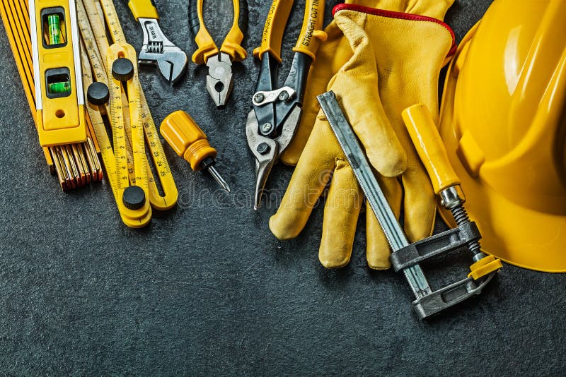 Yellow Construction Tools on Black Background Stock Image - Image of ...