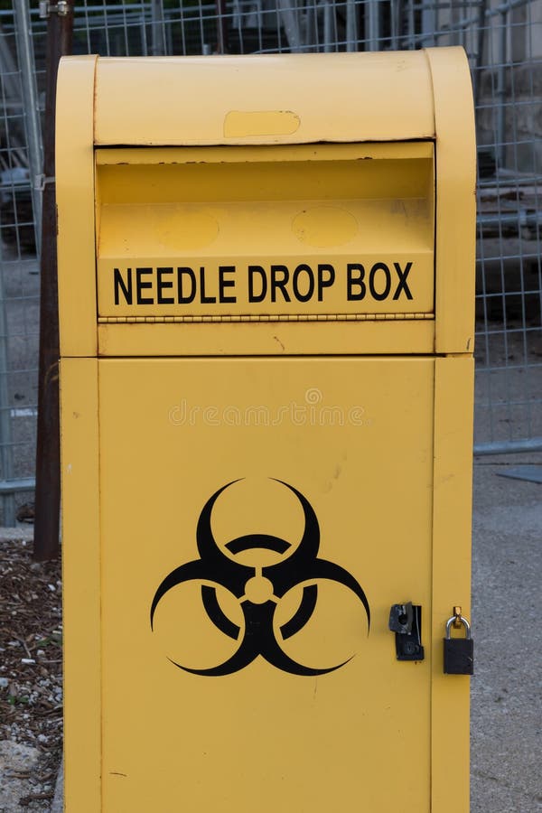 Yellow Container and Drop Box for Used Needles Stock Photo - Image of ...