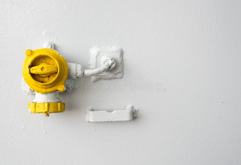 Yellow Control Industrial Switch on a White Metallic Surface Stock ...