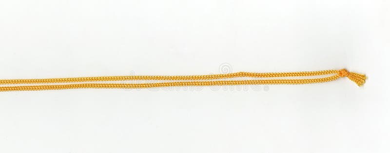 Yellow cord with a knot stock photo. Image of difficult - 62930858