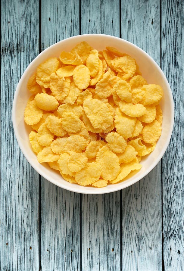 Yellow corn flakes stock photo. Image of breakfast, round - 65782418