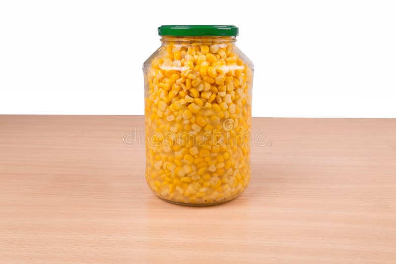 Yellow corn in glass jar stock photo. Image of tinned - 43768482