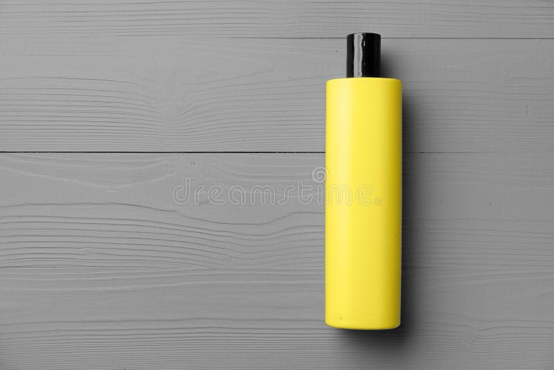 Yellow Cosmetic Container on Gray Background Top View Stock Photo ...