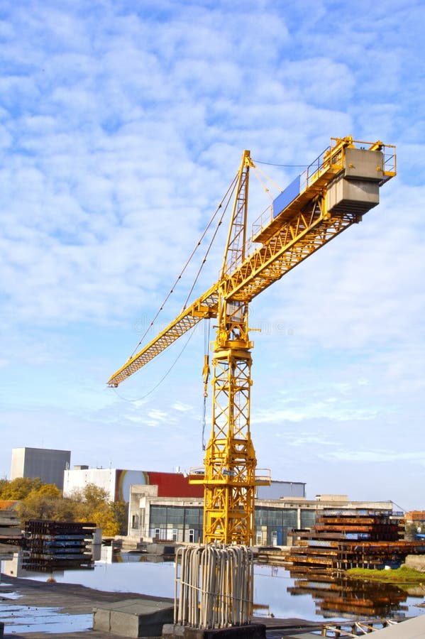 Yellow crane stock photo. Image of development, metal - 27531672