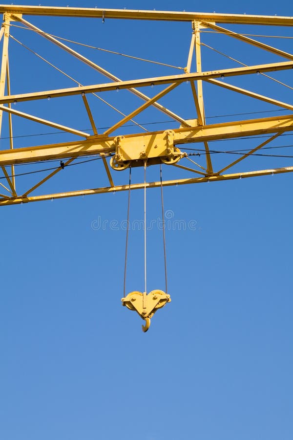 A yellow crane en detail stock photo. Image of construction - 112253686