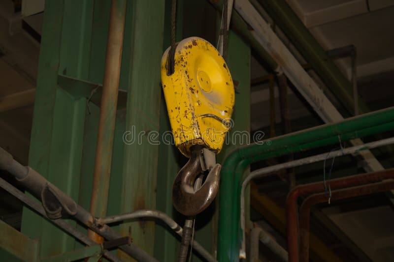 Industrial Yellow Crane Hook Hanging in the Factory Stock Photo - Image ...