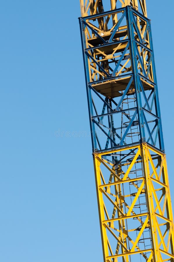 Yellow Crane Ladder with Blue Sky Background Stock Image - Image of ...