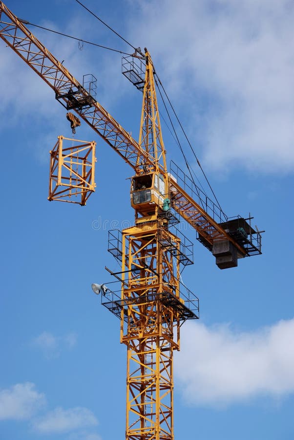 A yellow crane en detail stock photo. Image of construction - 112253686