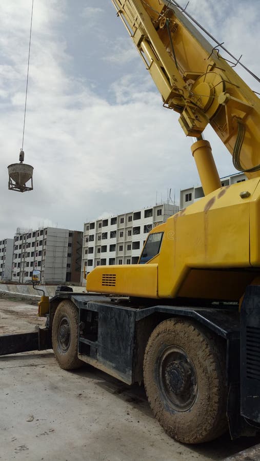 Yellow crane stock photo. Image of road, white, working - 93384676