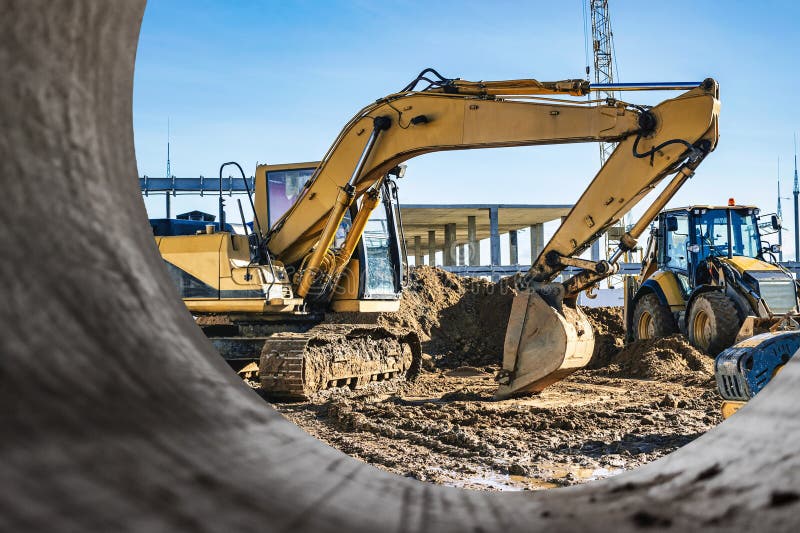 Yellow Crawler Excavator at the Construction Site. Earthworks at a ...