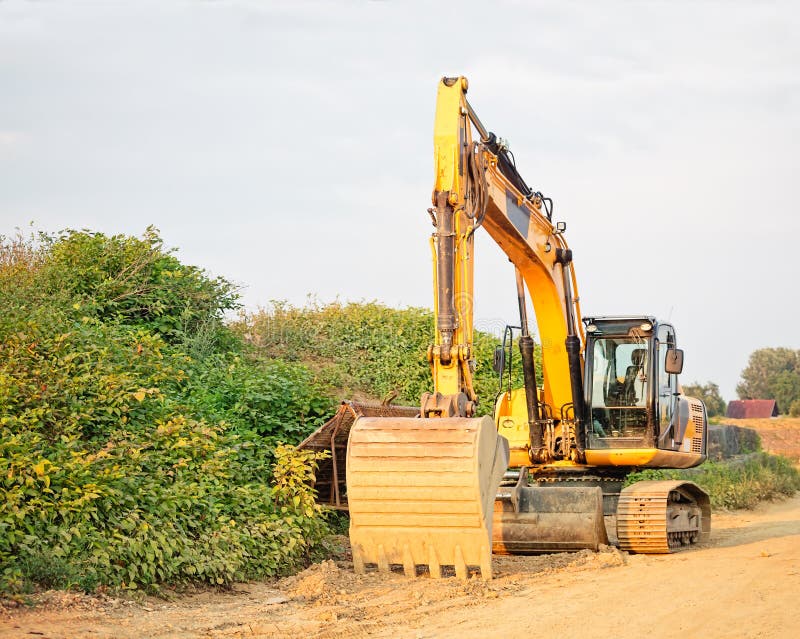 Yellow Crawler Excavator stock photo. Image of machine - 59845258
