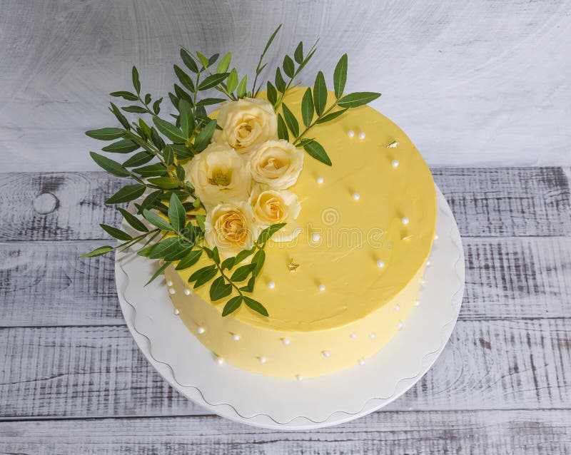 Yellow Cream Cheese Cake with Roses and Greenery Stock Image - Image of ...