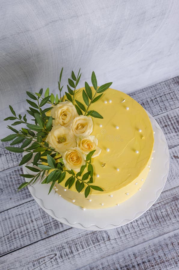 Yellow Cream Cheese Cake with Roses and Greenery Stock Image - Image of ...
