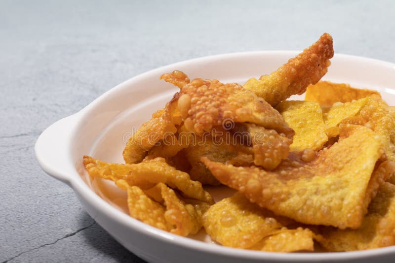 Yellow Crispy Dumplings on a White Plate Stock Image - Image of asia ...
