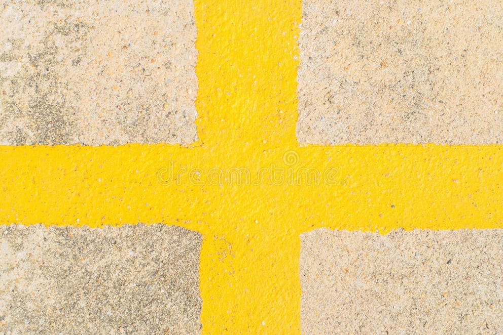 Yellow Cross on the Road stock image. Image of crossing - 58982663