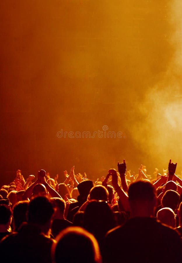 Yellow crowd at concert stock image. Image of arms, encore - 5505809