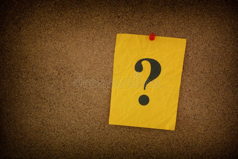 Yellow Crumpled Paper Note with Question Marks on it Pinned To a Cork ...