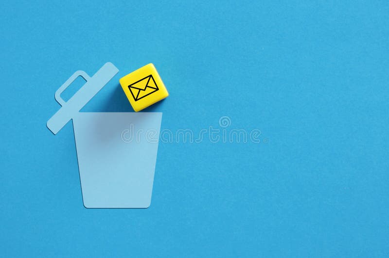 Yellow Cube with Email Symbol Falling into Blue Trash Can Stock Image ...