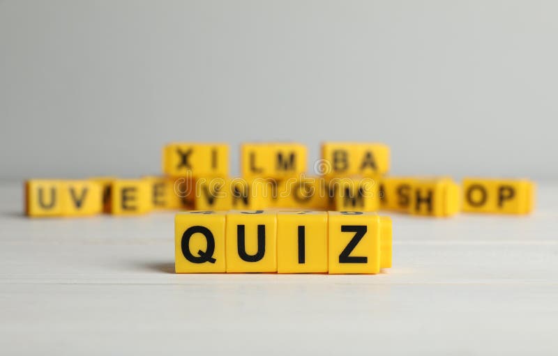 Yellow Cubes with Word Quiz on Table. Space for Text Stock Photo ...