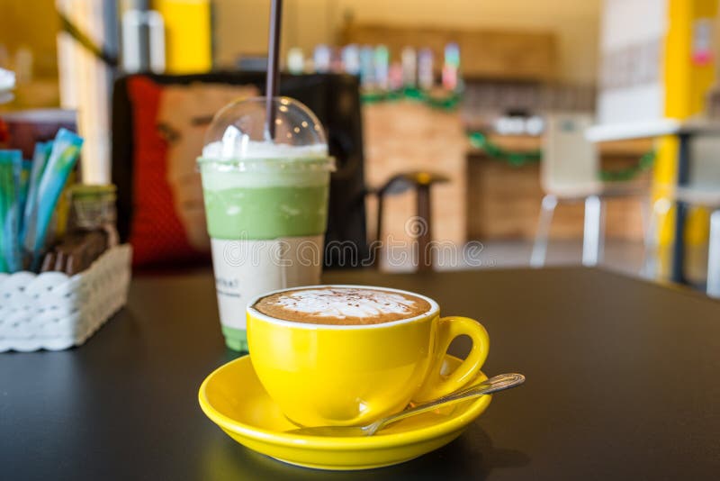 Yellow Cup of Coffee on Cafe Table Stock Image - Image of yellow, relax ...