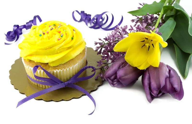 Yellow Cupcake with Fresh Tulips Stock Photo - Image of bake, celebrate ...