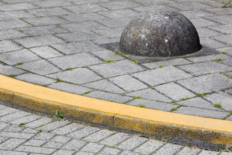 Yellow curb and obstacle stock photo. Image of single - 95079442