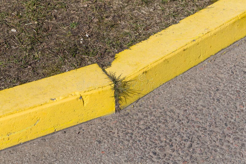 Yellow curb stone border stock photo. Image of kerb - 271753218