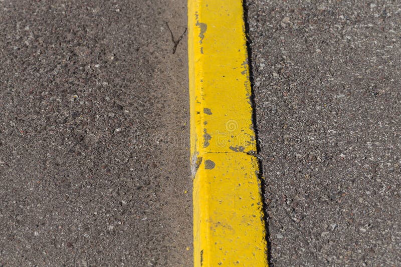 Yellow curb stone border stock photo. Image of detail - 275169834