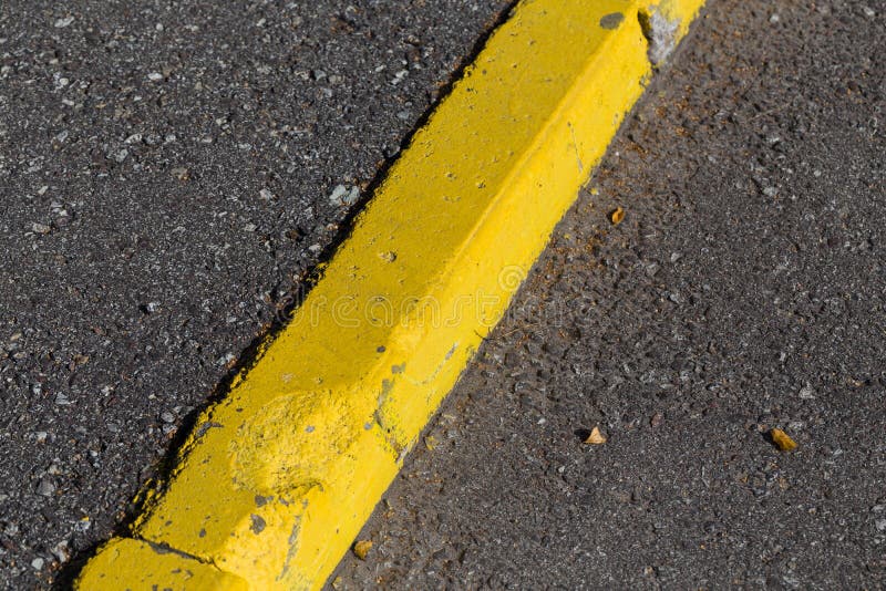 Yellow curb stone border stock image. Image of road, green - 44921667