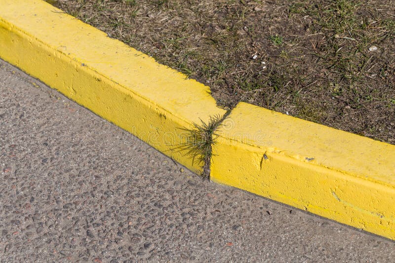 Yellow curb stone border stock photo. Image of lane, roadside - 46931540