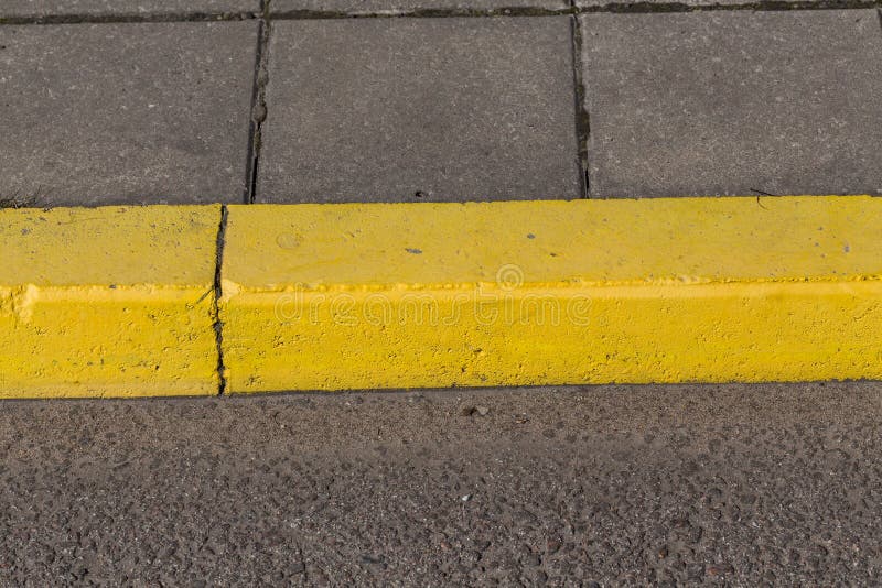 Yellow curb stone border stock image. Image of detail - 57055029