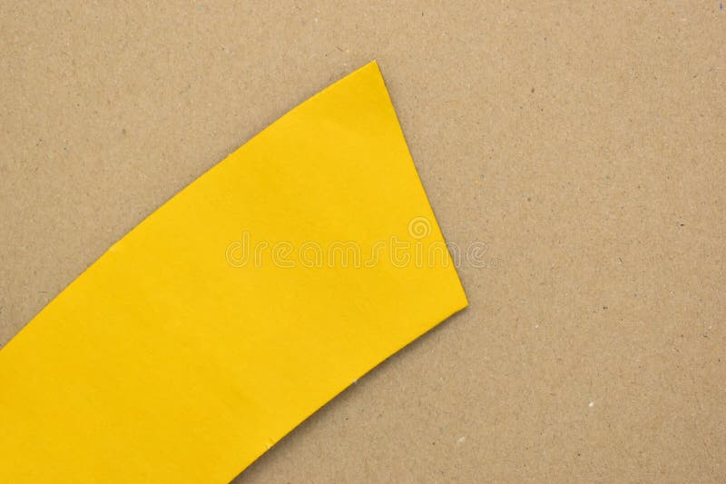 Yellow Curve Paper Put on Brown Background Stock Image - Image of ...