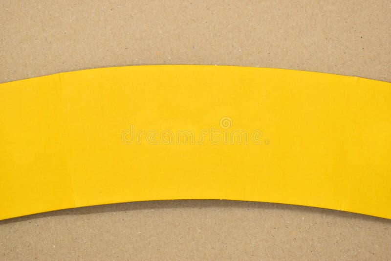 Yellow Curve Paper Put on Brown Background Stock Image - Image of ...