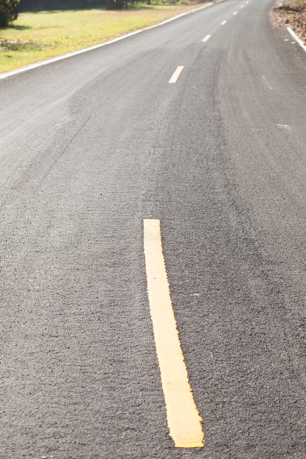 Yellow Curve Line on the Road Stock Photo - Image of lane, line: 25147784