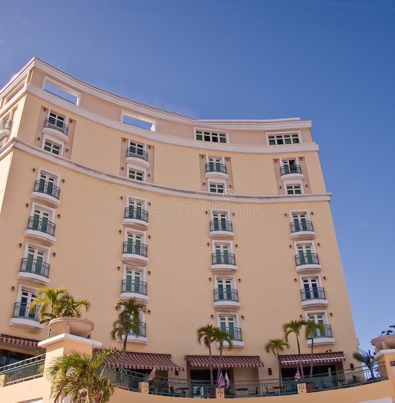 Yellow Curved Hotel with Green Balconies Stock Photo - Image of ...