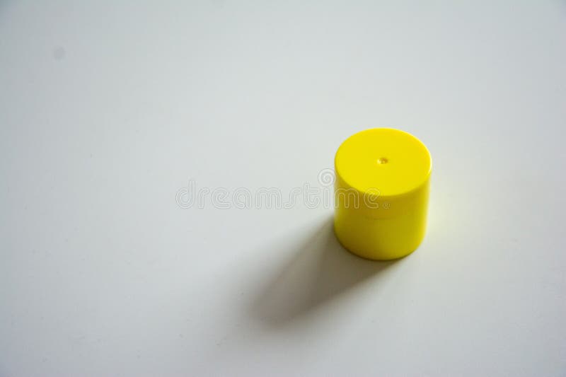 Yellow Cylindrical Object, Minimalist Background Stock Image - Image of ...