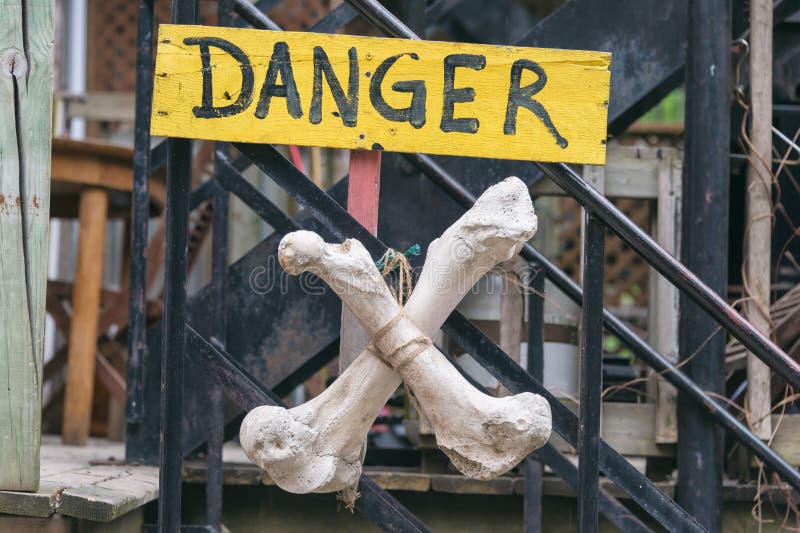 Yellow Danger Quicksand, Please Say Clear of the Wreck Sign on a Tree ...