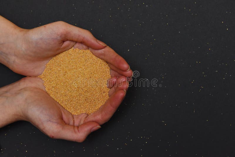 Yellow Decorative Fine Sand in Two Hands Stock Photo - Image of concept ...